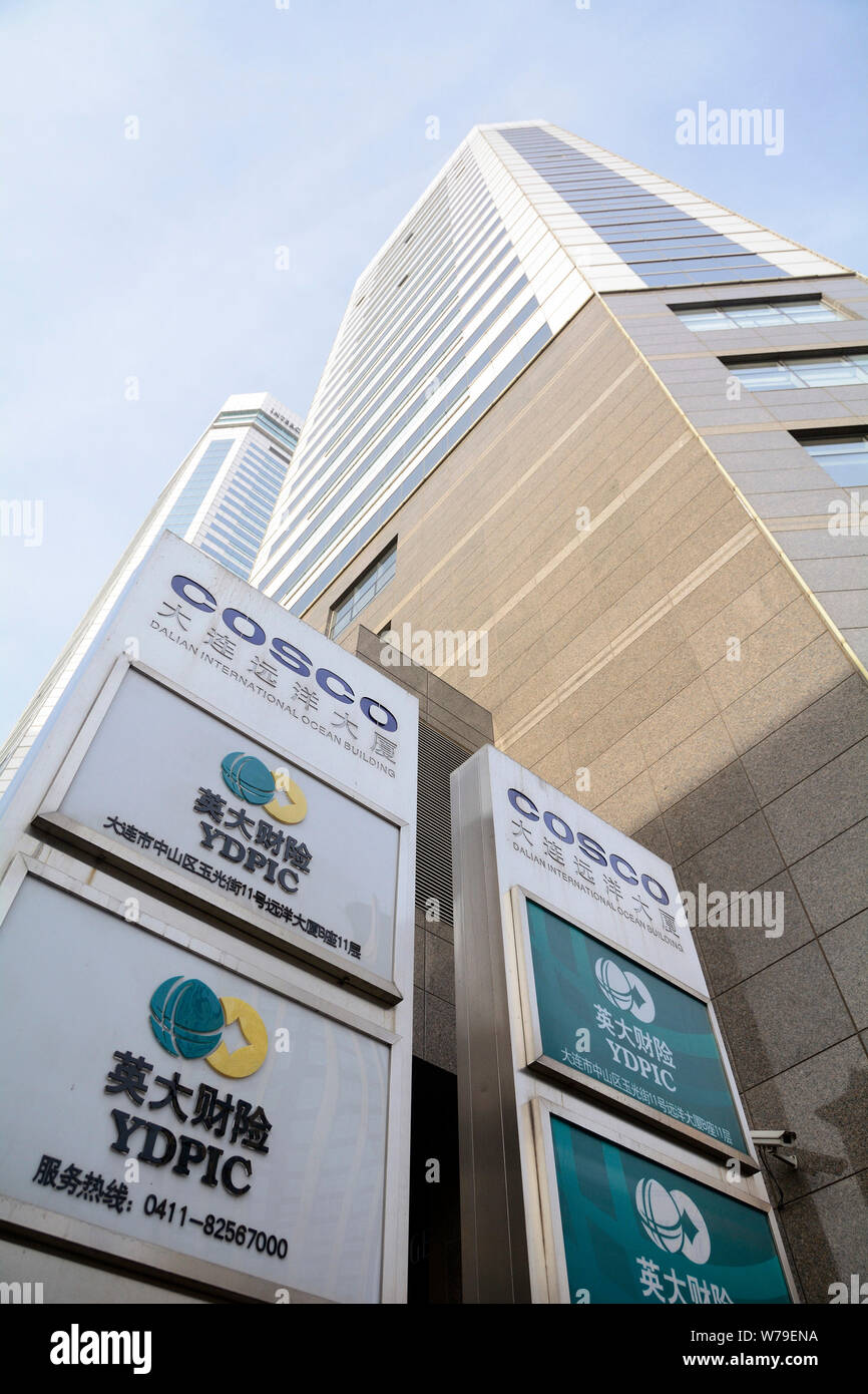 --FILE--Logos of COSCO are pictured in front of the Dalian ...