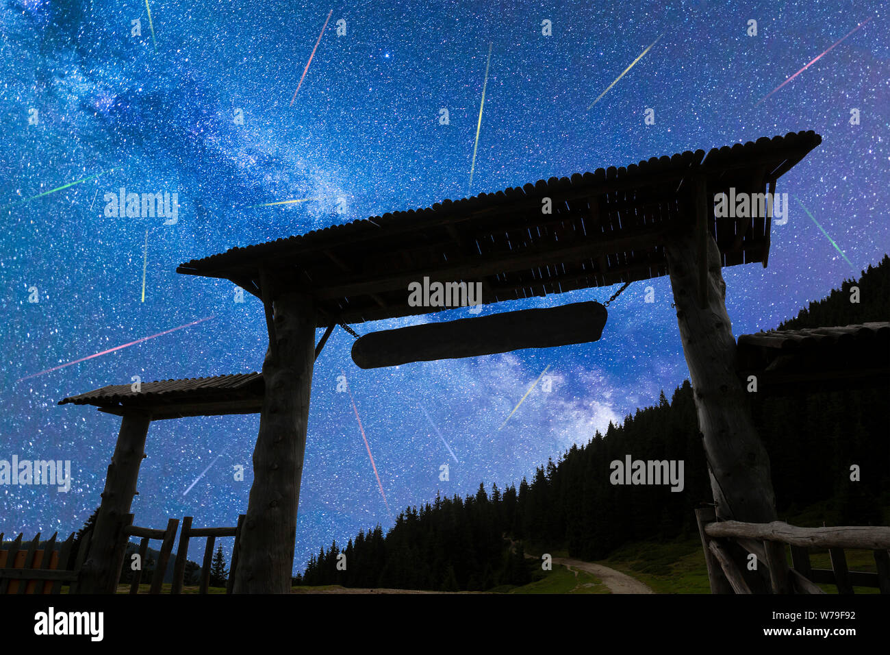A view of a Meteor Shower and the blue Milky Way with wooden entrance ...