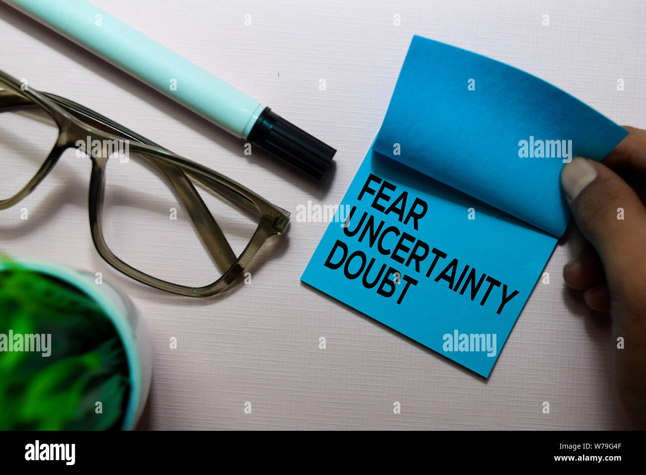 Fear Uncertainty Doubt (FUD) text on sticky notes isolated on office ...