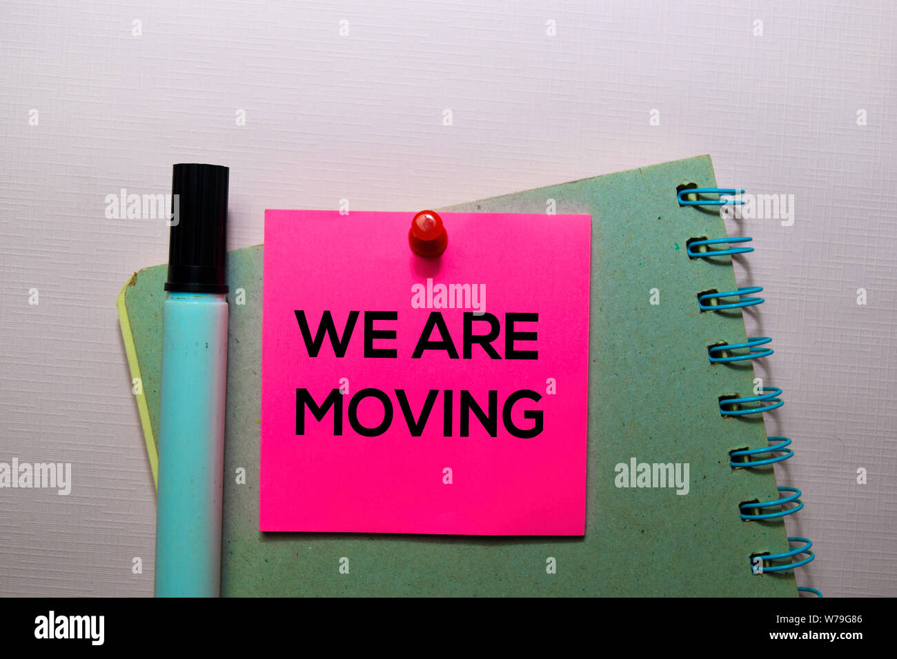 We Are Moving text on sticky notes isolated on office desk Stock Photo ...