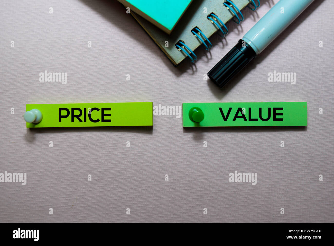 Price Vs Value text on sticky notes isolated on office desk Stock Photo ...