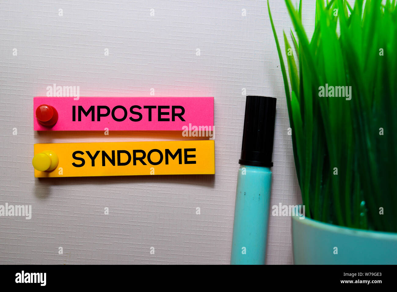 Imposter Syndrome text on sticky notes isolated on office desk Stock ...