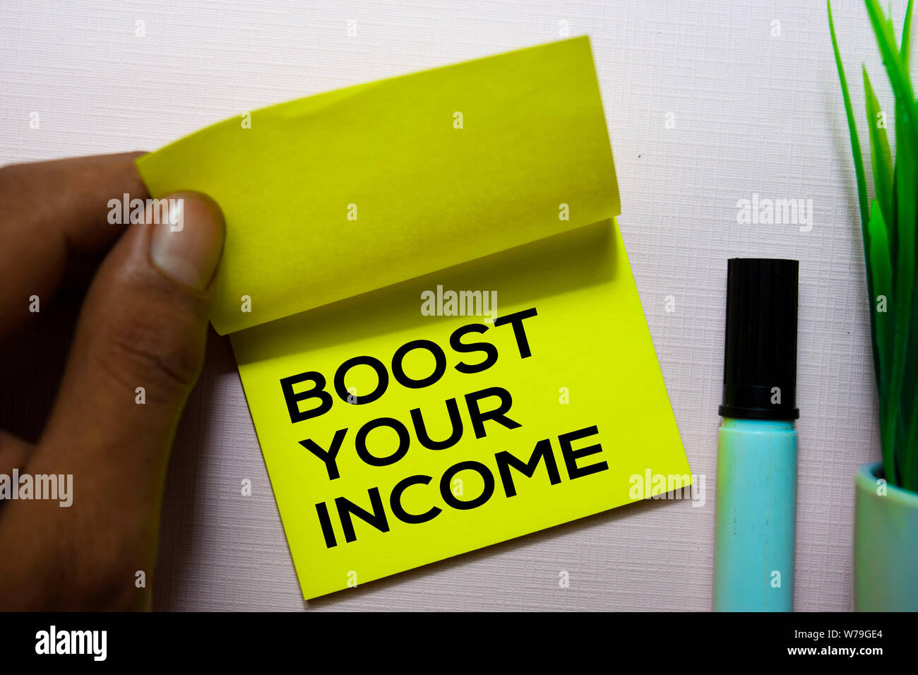 Boost Your Income text on sticky notes isolated on office desk Stock ...