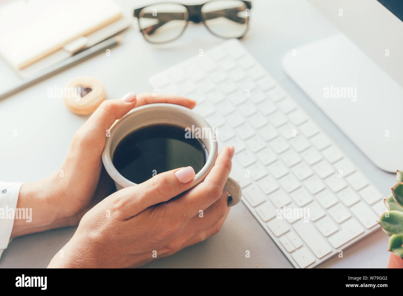 Coffee break in the office Stock Photo - Alamy