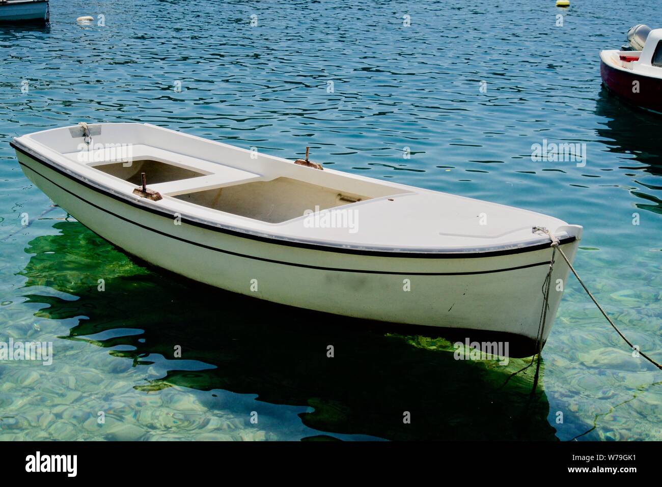 White row boat blue hi-res stock photography and images - Alamy