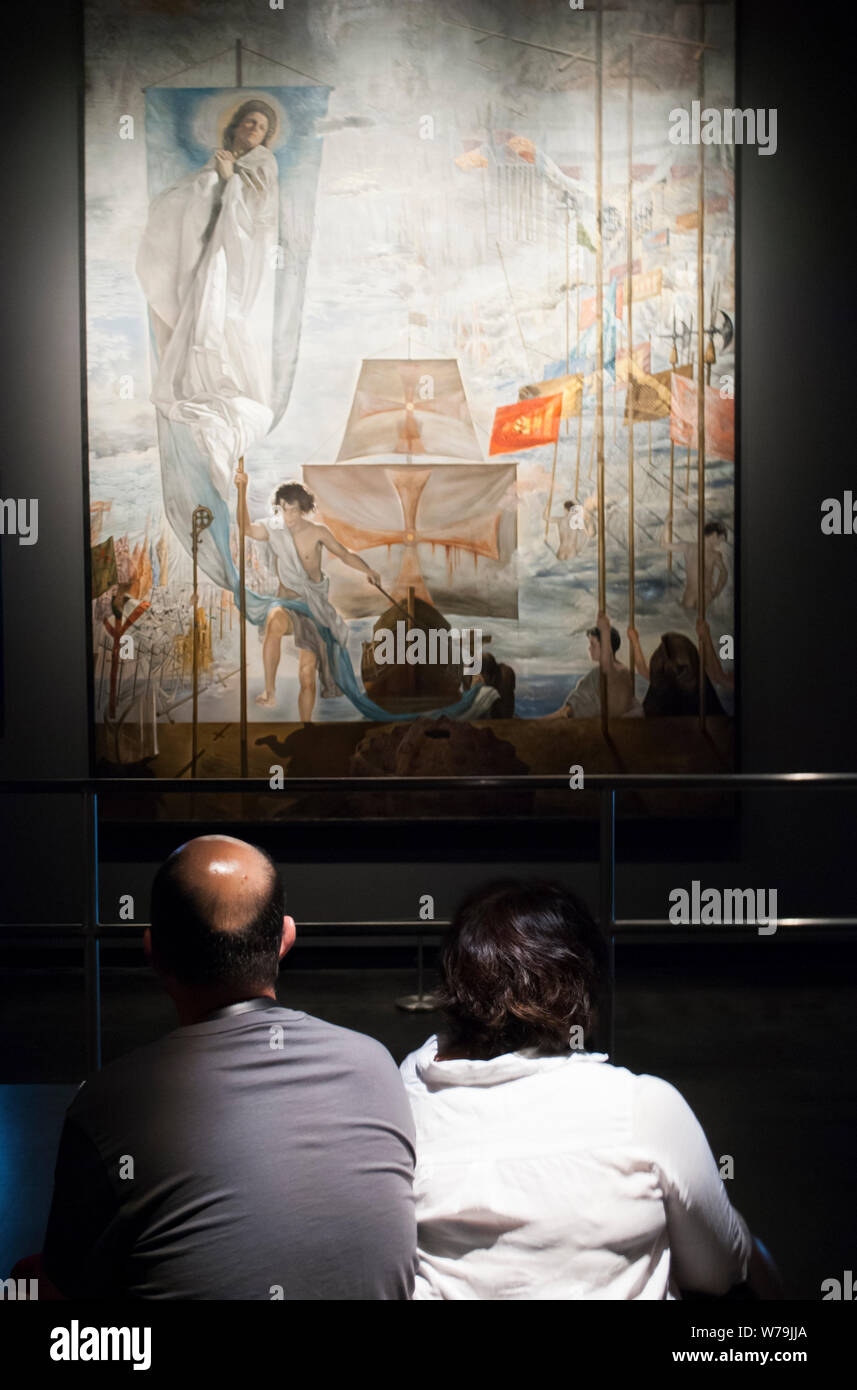 Family watching at the canvas by S. Dali "The discovery of America by ...