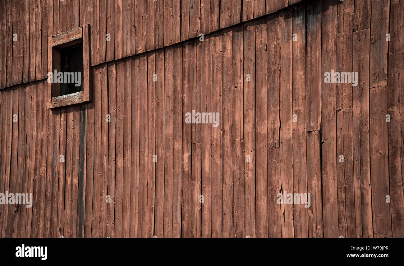 Square hay loft window on side of red barn Stock Photo - Alamy