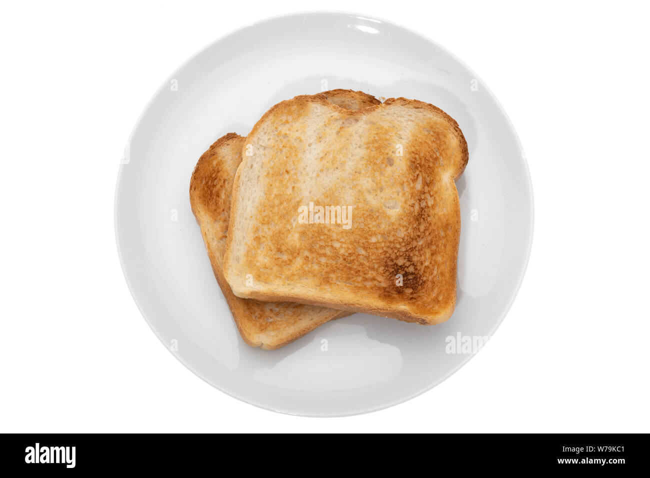 Toasted white bread on a plate - white background Stock Photo - Alamy