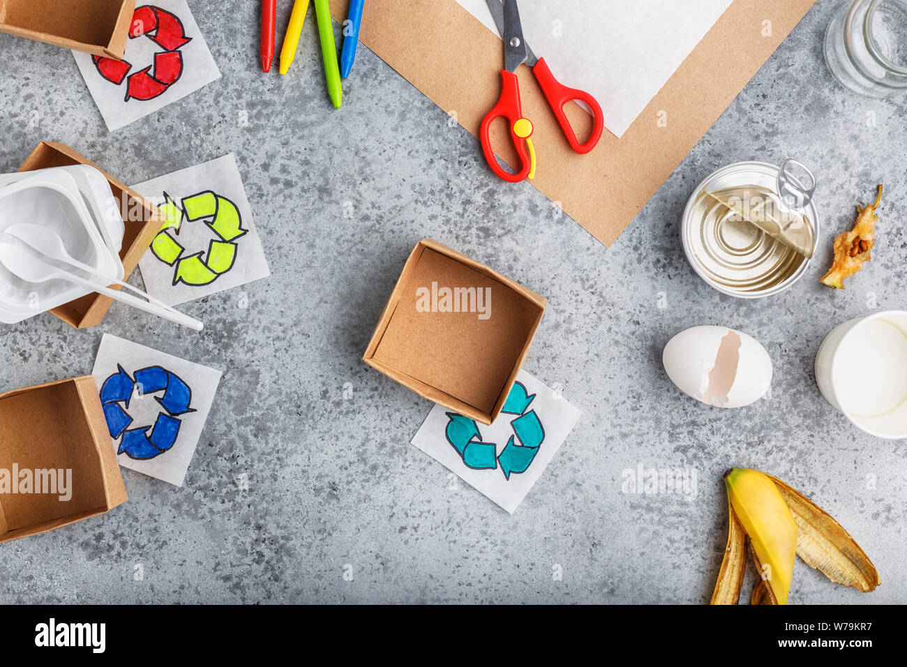 Kids hands is making recycling game kid is drawing recycle sign paper ...