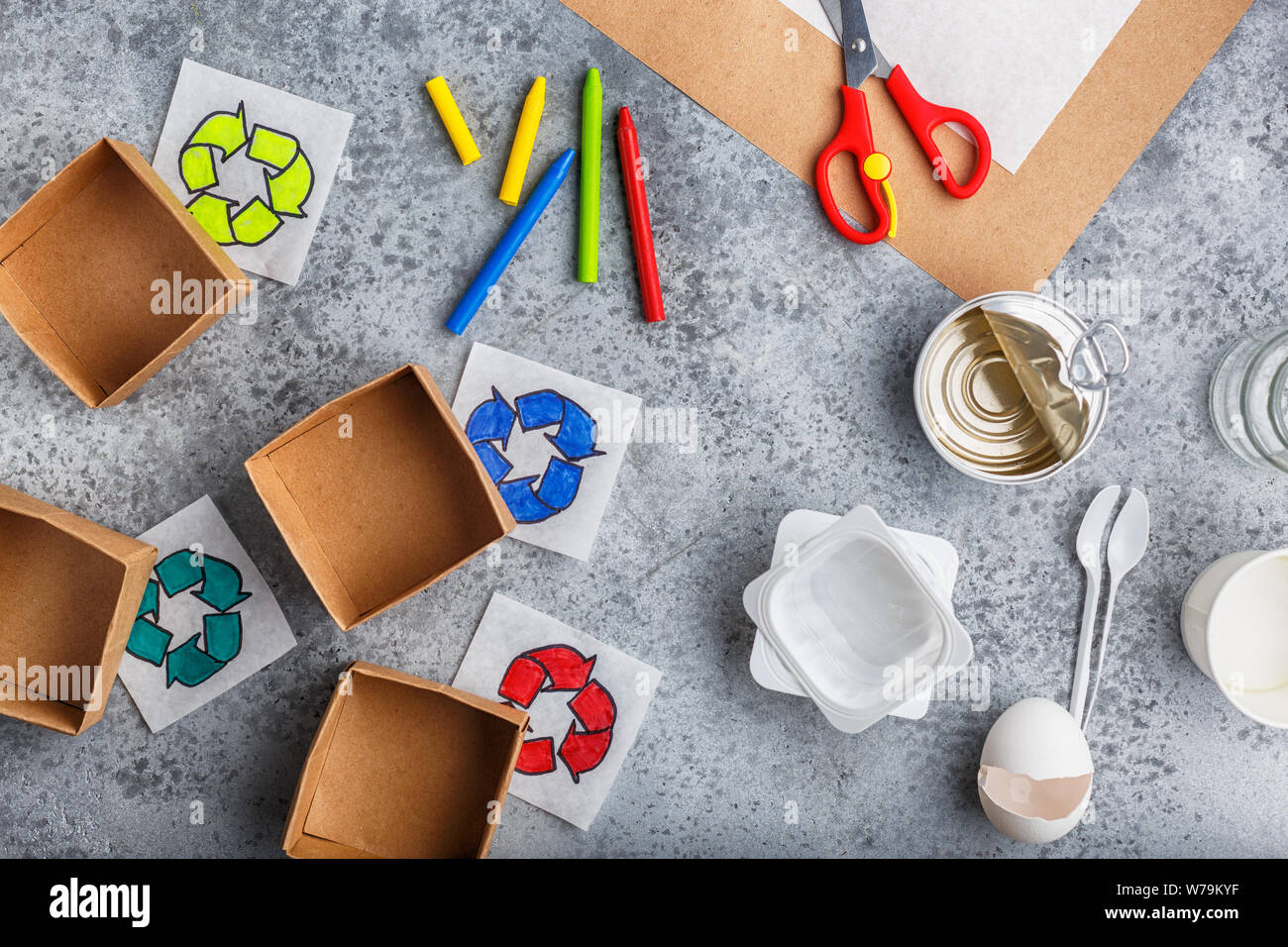 Kids hands is making recycling game kid is drawing recycle sign paper ...