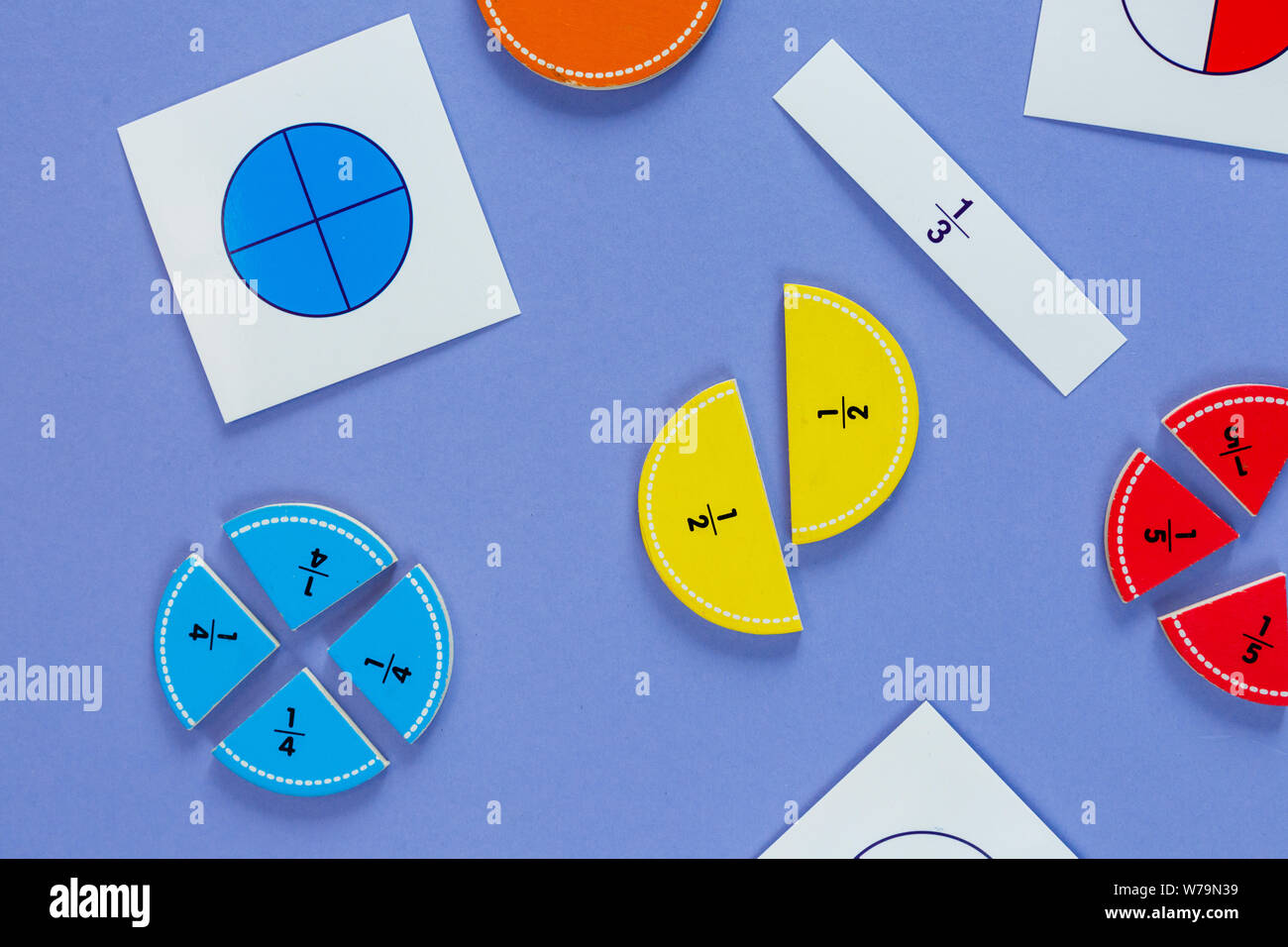 Сolorful math fractions on violet background. Interesting math for kids ...