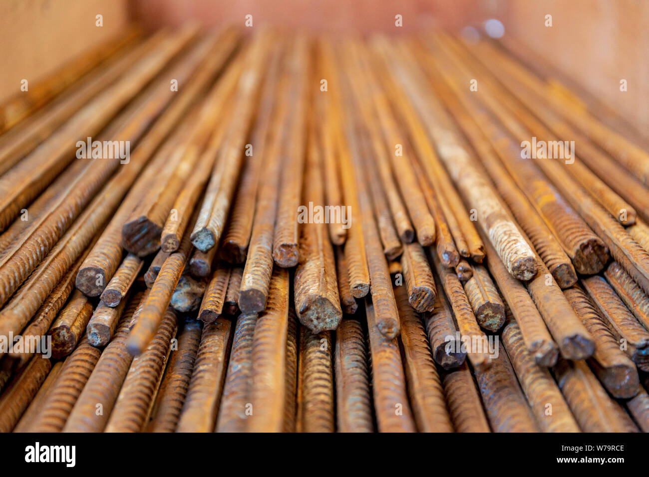 Close up selected focus view stack of straight old rusty high yield ...
