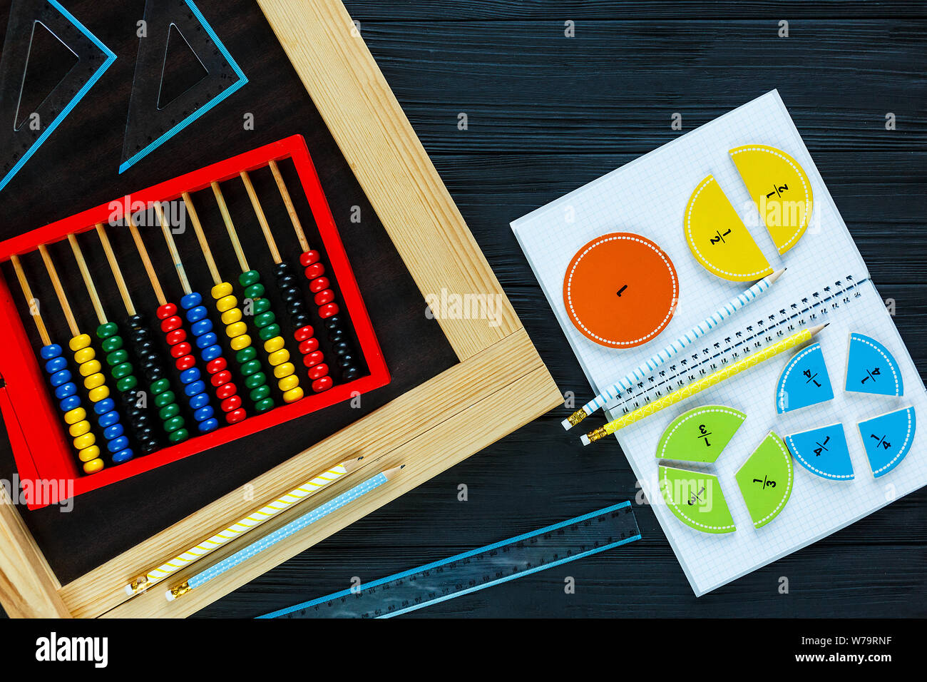Creative Сolorful math fractions on dark background. Interesting funny ...