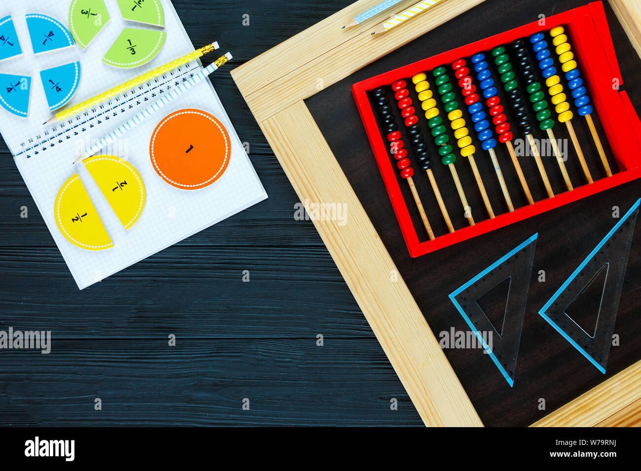 Creative Сolorful math fractions on dark background. Interesting funny ...