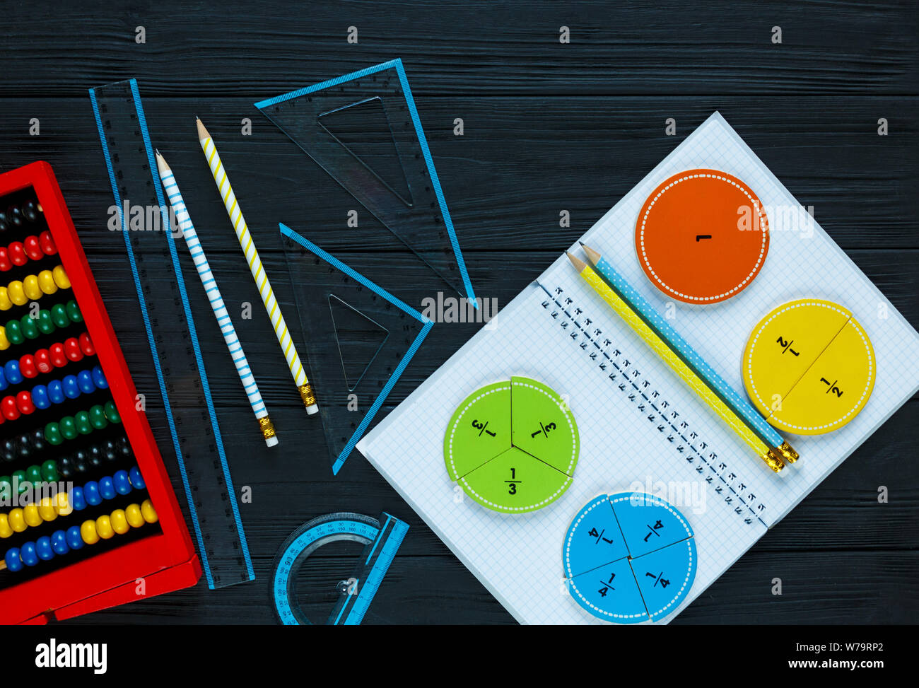 Creative Сolorful math fractions on dark background. Interesting funny ...