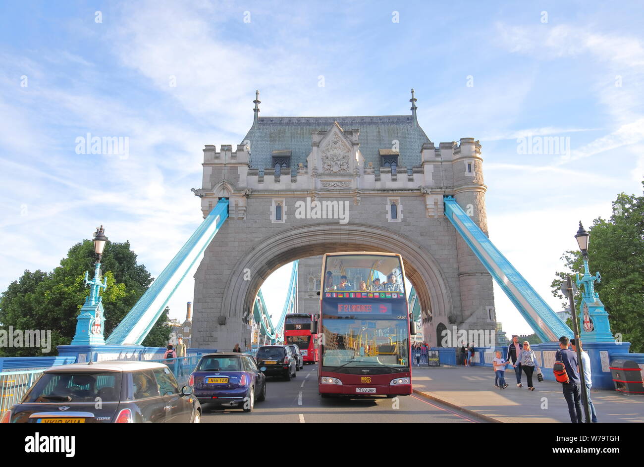 Tourist bus drive through Tower bridge London England Stock Photo - Alamy