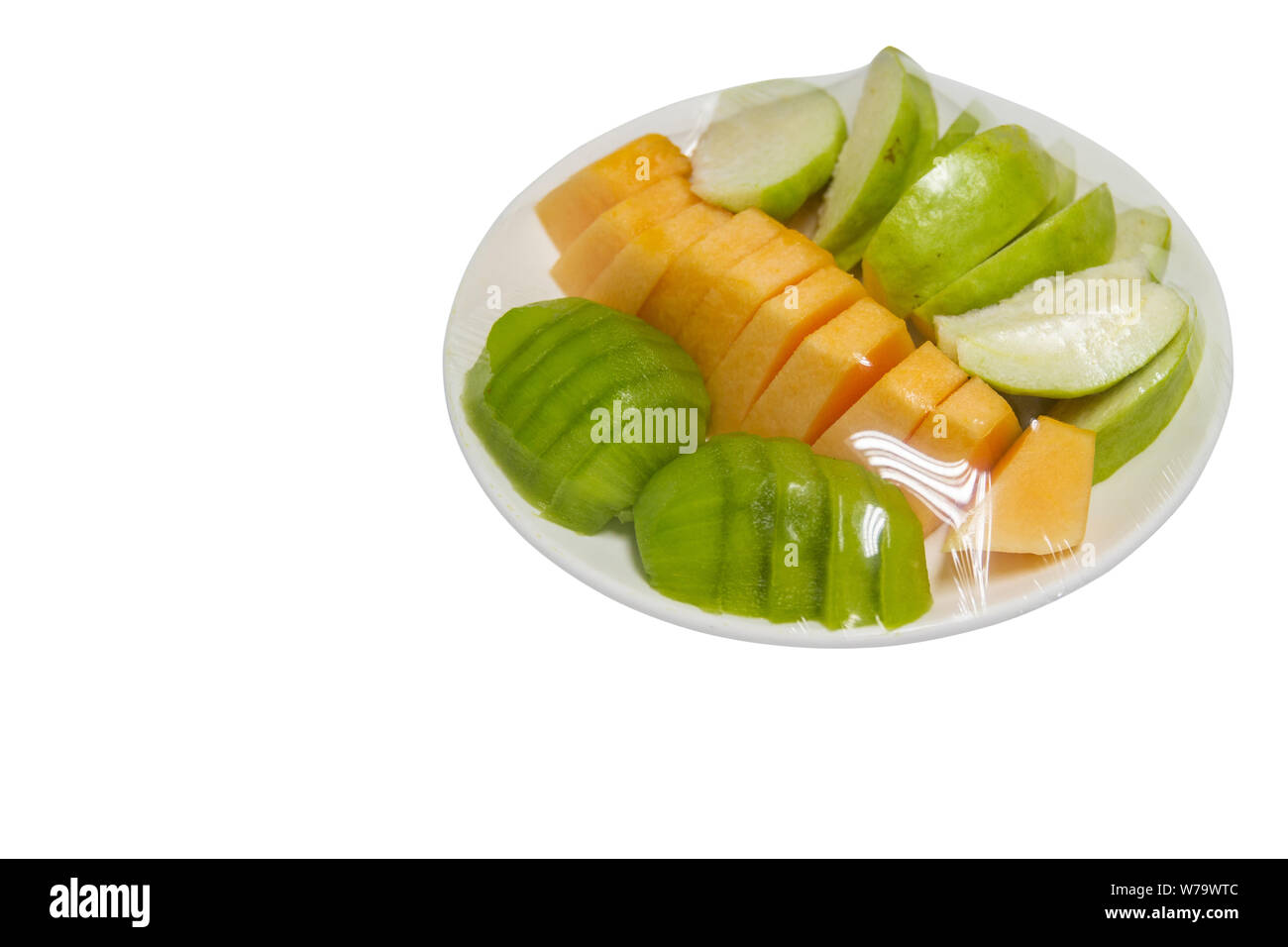 fruits which are wrapped with plastic film preservation on a table ...