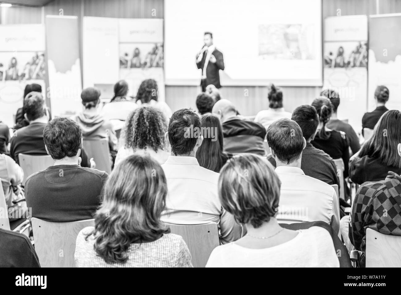 Business speaker giving a talk at business conference event Stock Photo ...