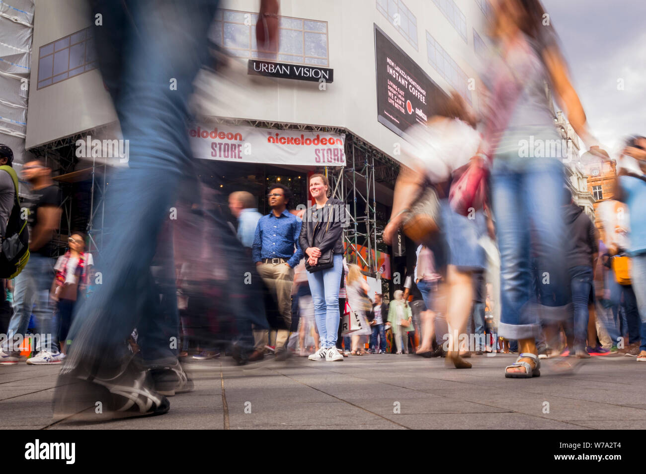 Movement and motion blur of busy people shopping in London Stock Photo ...