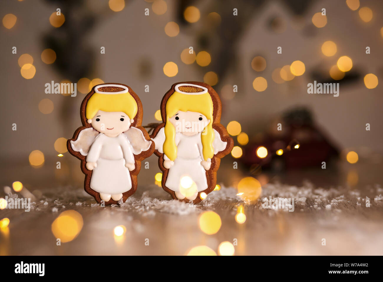 Holiday traditional food bakery. Gingerbread pair of little cute angels ...