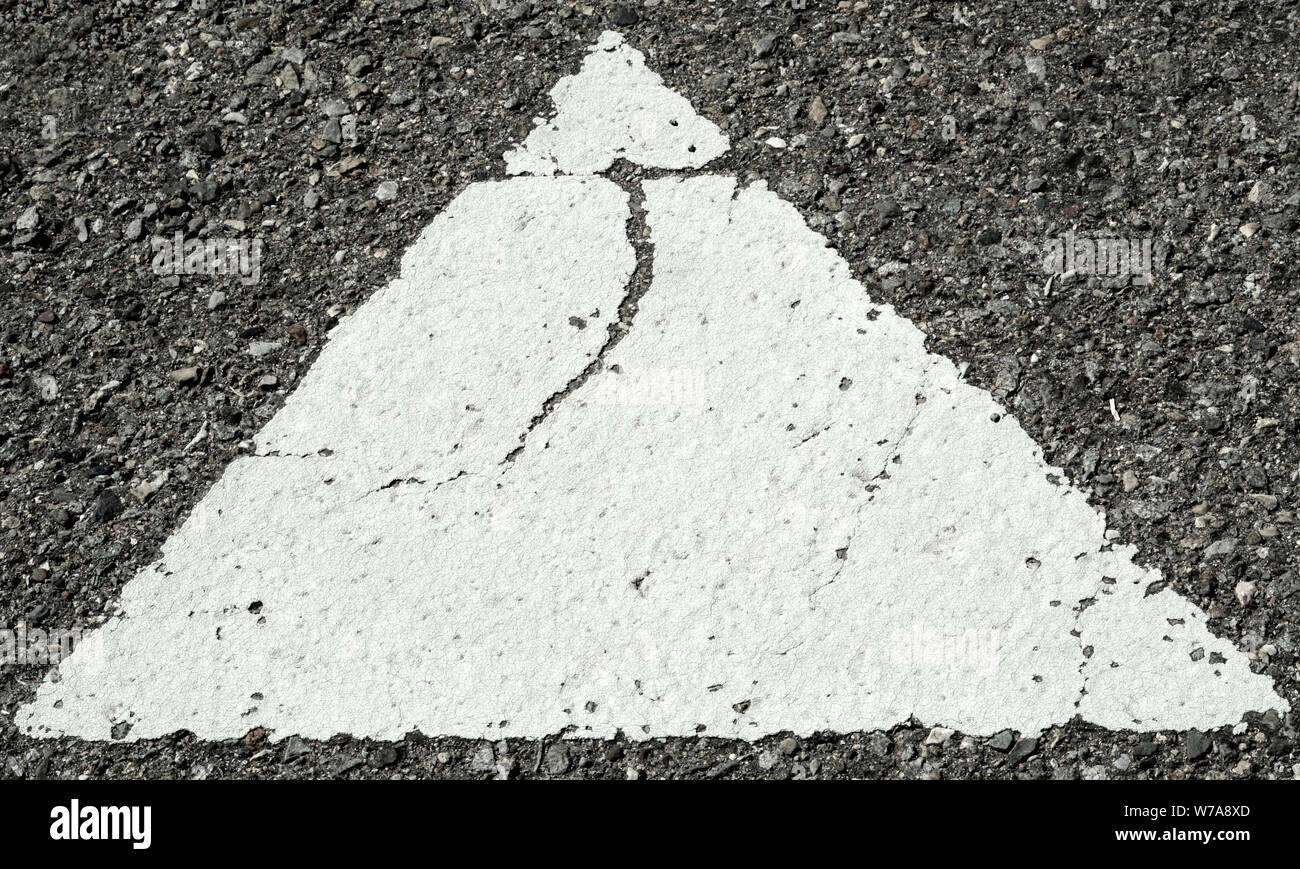 Painted triangle on road hi-res stock photography and images - Alamy