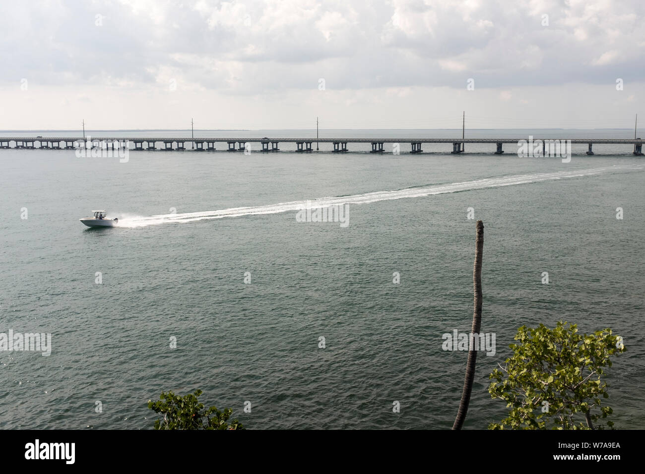 A boat crusing across the bay off Calusa Beach, Bahia Honda State Park ...