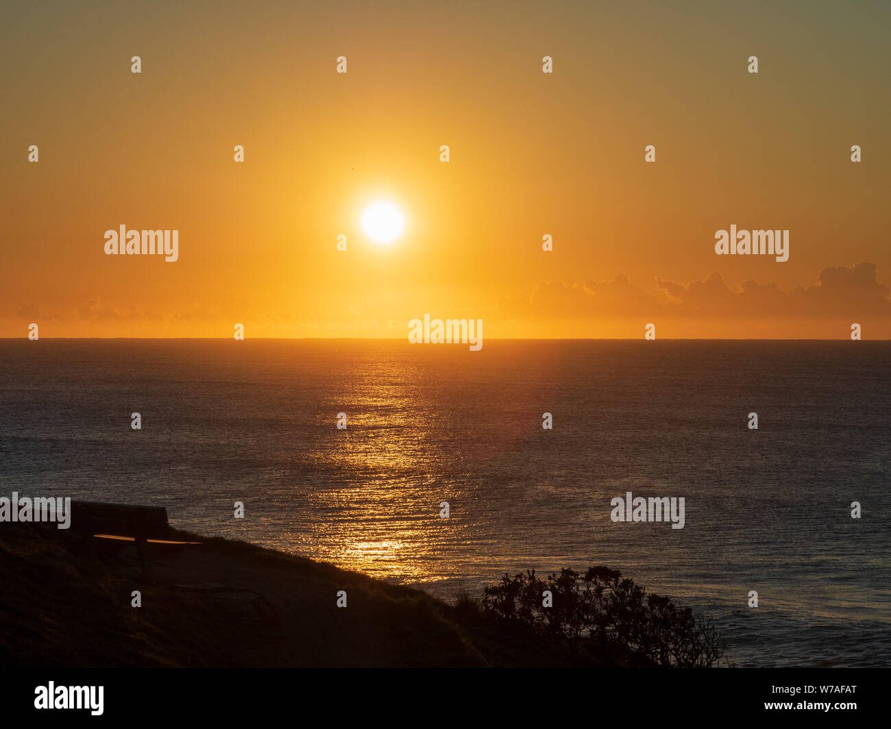 Sun reflecting in the water, Sunrise over the Ocean, Australia Stock ...