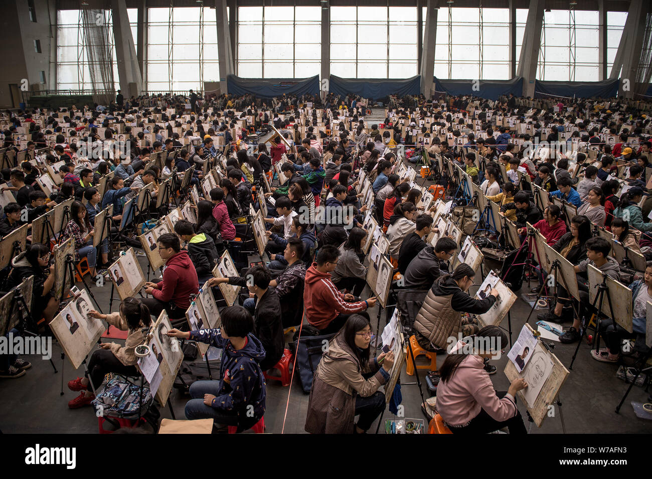 Students take part in a simulation of the entrance examination for the ...
