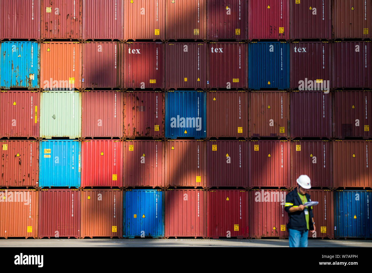 Containers to be shipping abroad are piled up in the Da Chan Bay ...