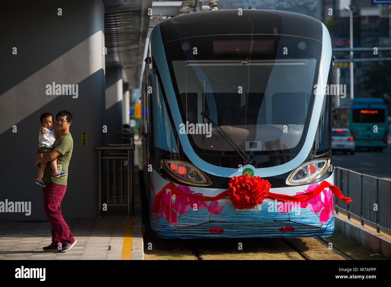 A tramcar makes a stop at a station on the city's first tram line in ...