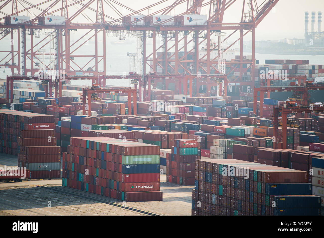 General view of the Da Chan Bay Terminal piled high with containers to ...