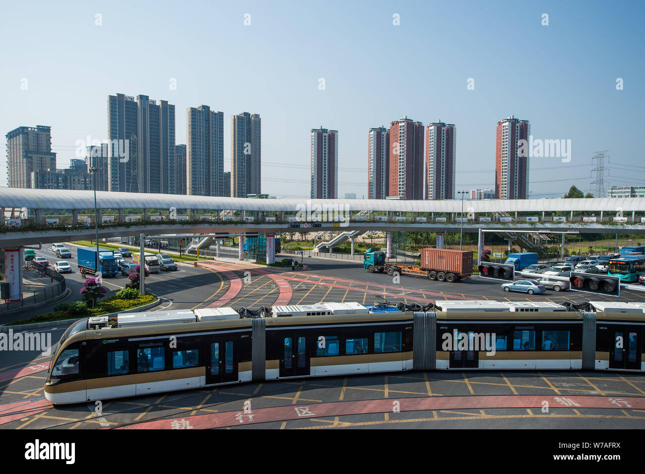 A tramcar runs on the city's first tram line in Shenzhen city, south ...