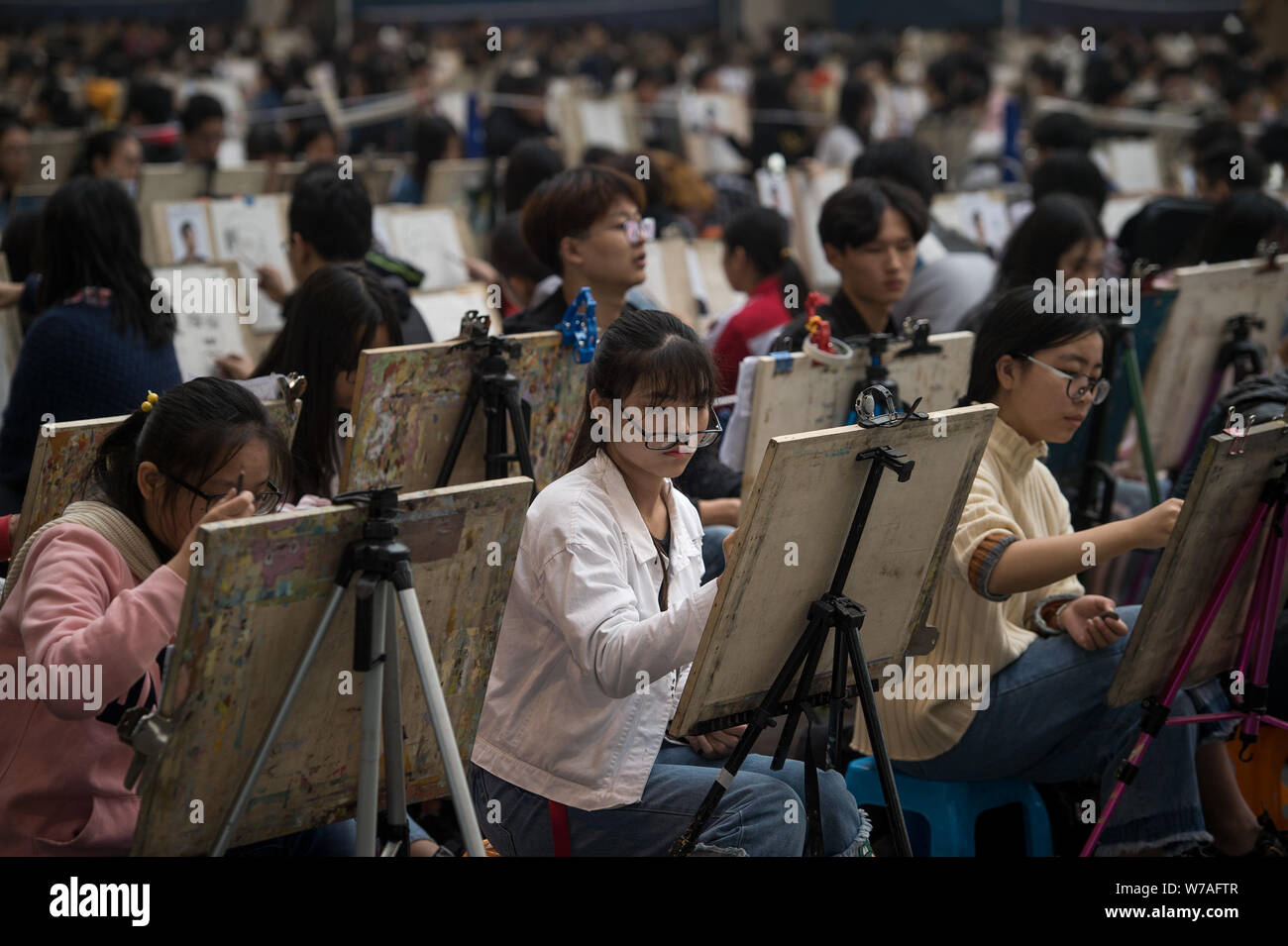 Students take part in a simulation of the entrance examination for the ...