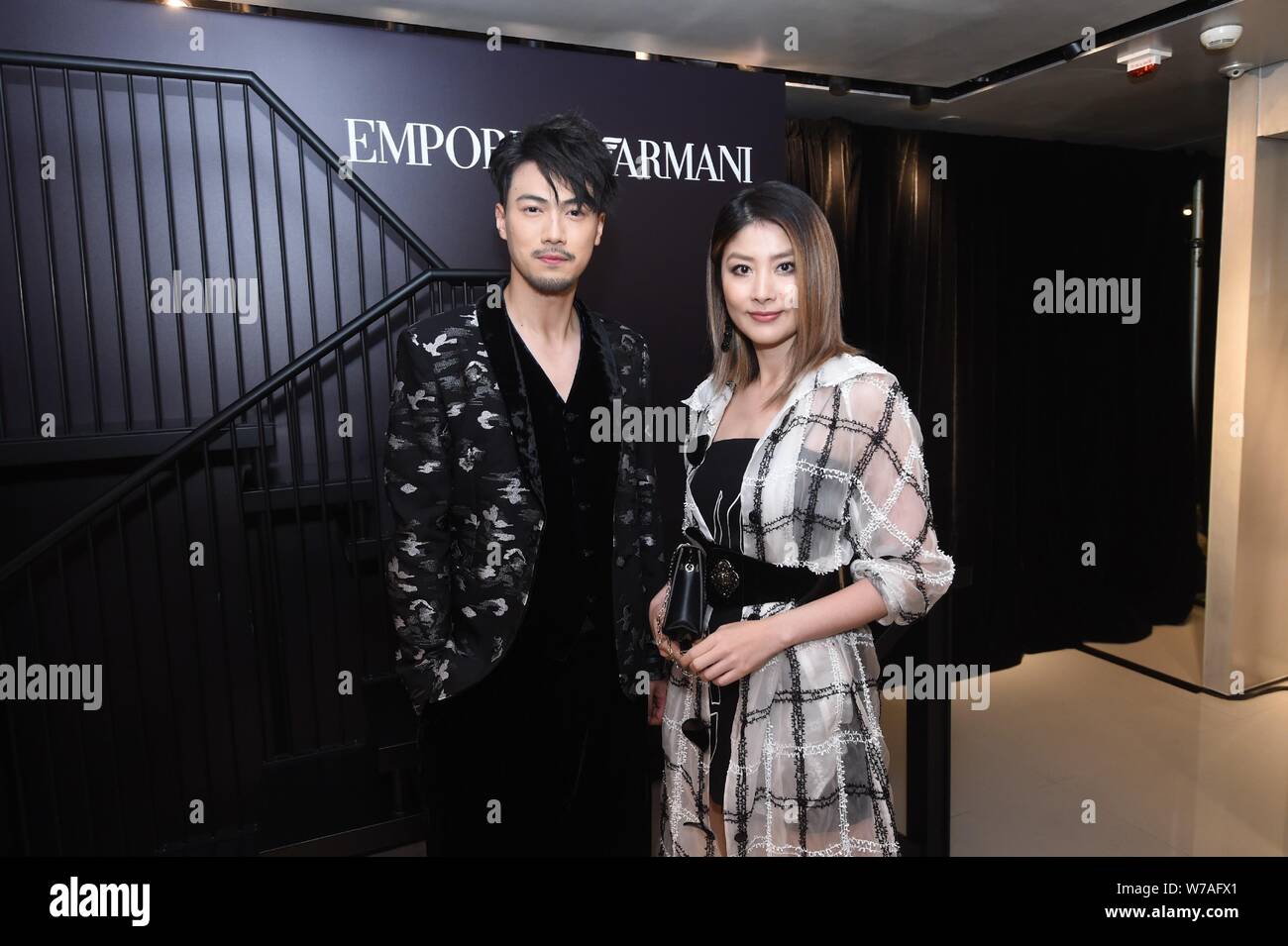 Hong Kong singer and actress Kelly Chen, right, poses as she arrives at ...