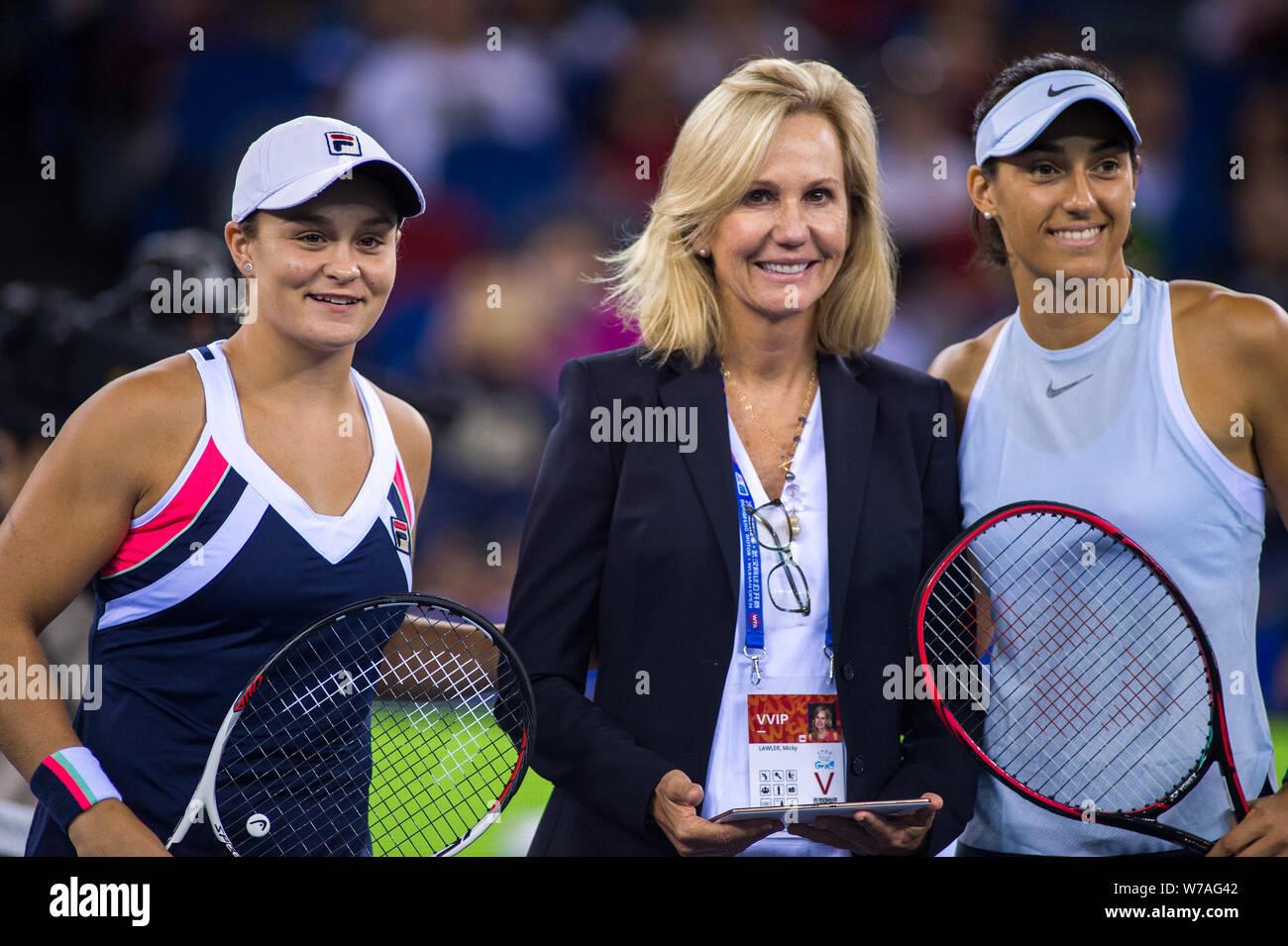 Winner Caroline Garcia of France , right, and Ashleigh Barty of ...