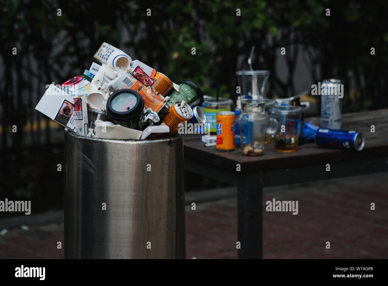 Overflowing trash can hi-res stock photography and images - Alamy