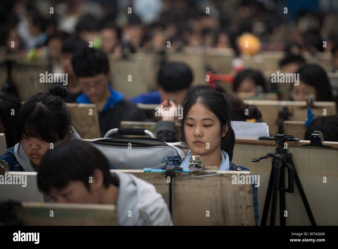 Students take part in a simulation of the entrance examination for the ...