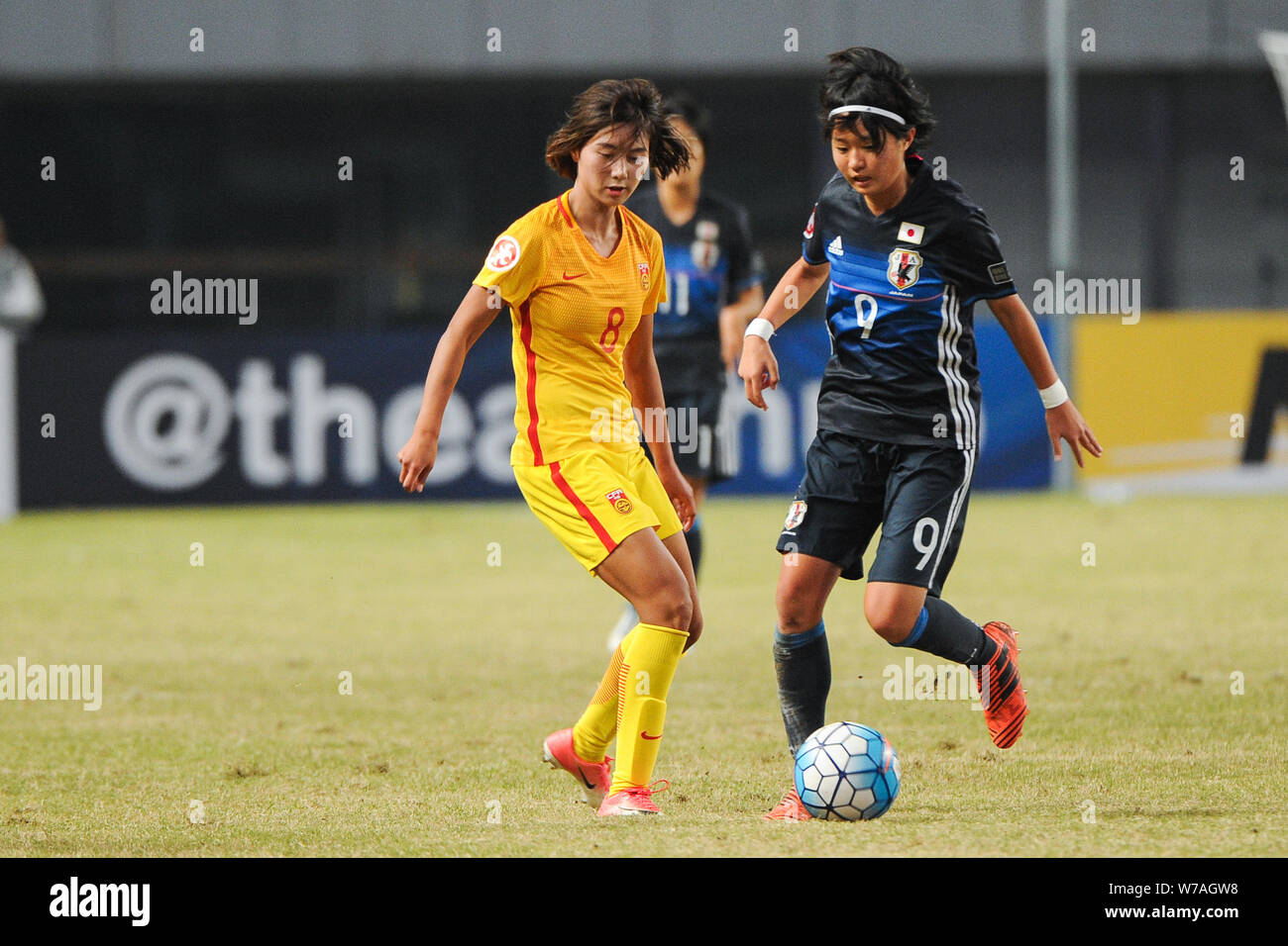 Shen Mengyu of China, left, challenges Hinata Miyazawa of Japan in ...