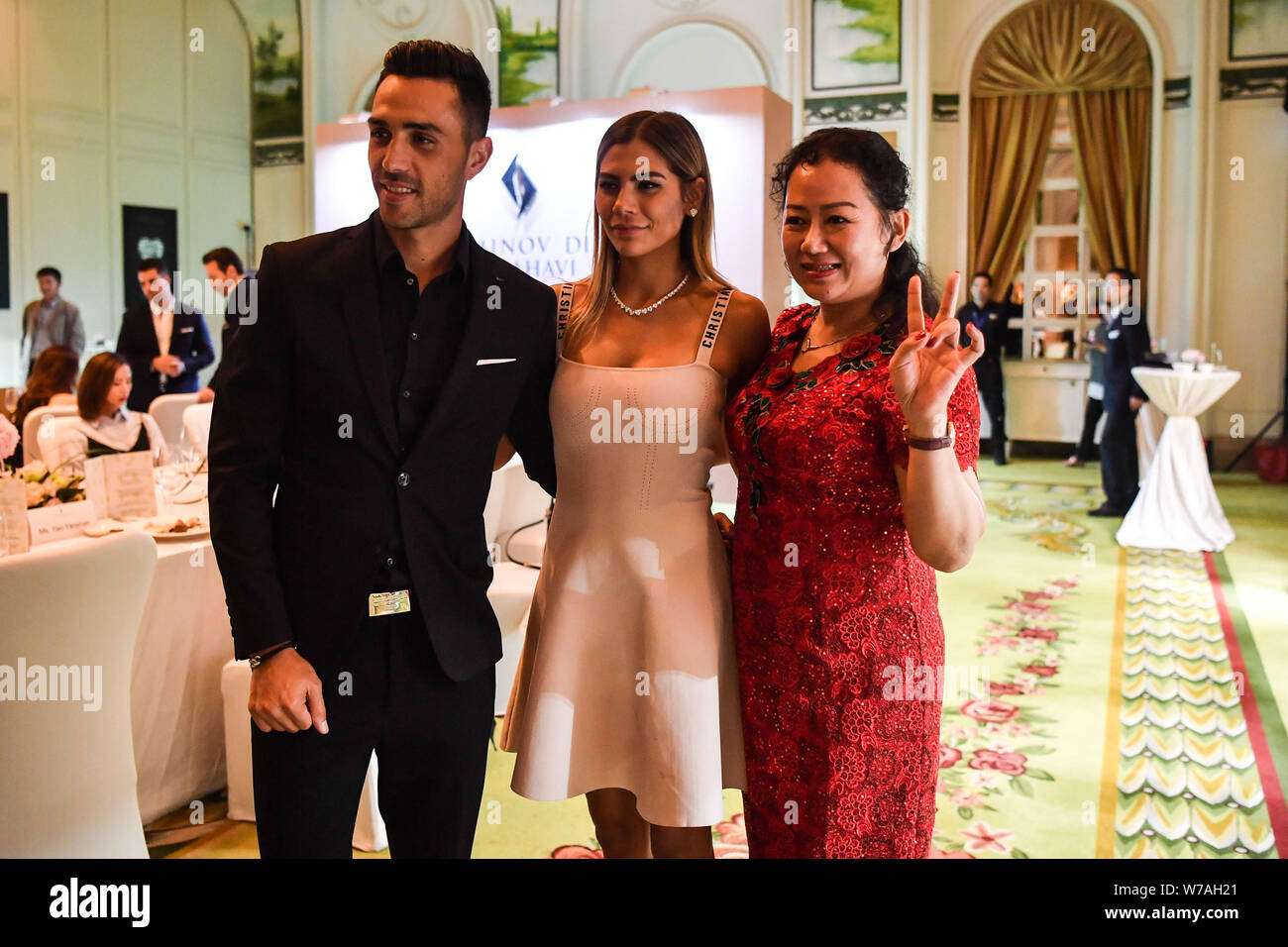 Israeli football player Eran Zahavi, left, of Guangzhou R&F, attends a ...