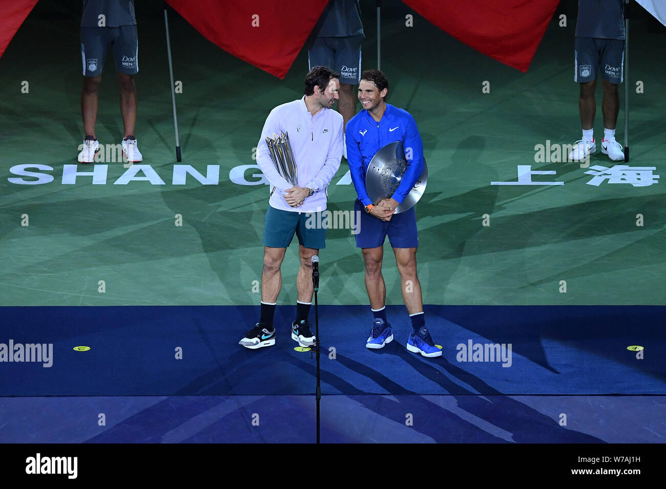 Winner Roger Federer of Switzerland, left, and first runner-up Rafael Nadal of Spain pose with ...