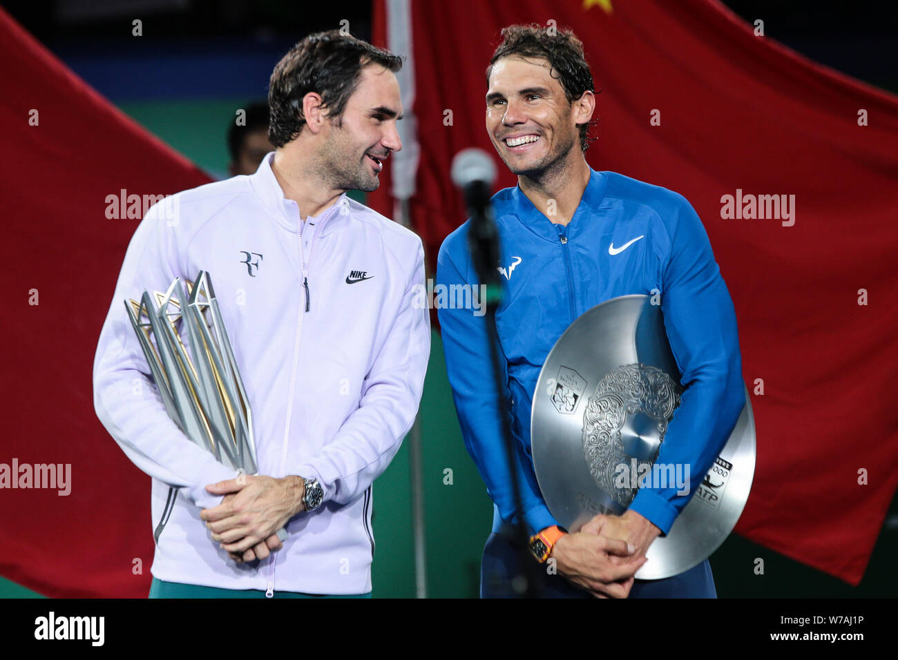 Winner Roger Federer of Switzerland, left, interacts with first runner-up Rafael Nadal of Spain ...