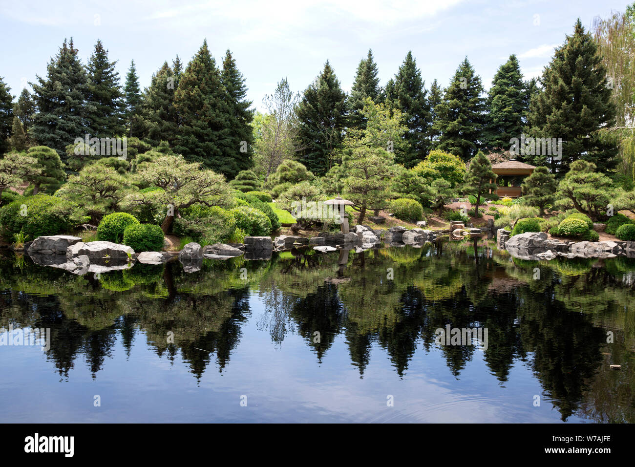 Japanese Garden with pond and rocks Stock Photo - Alamy