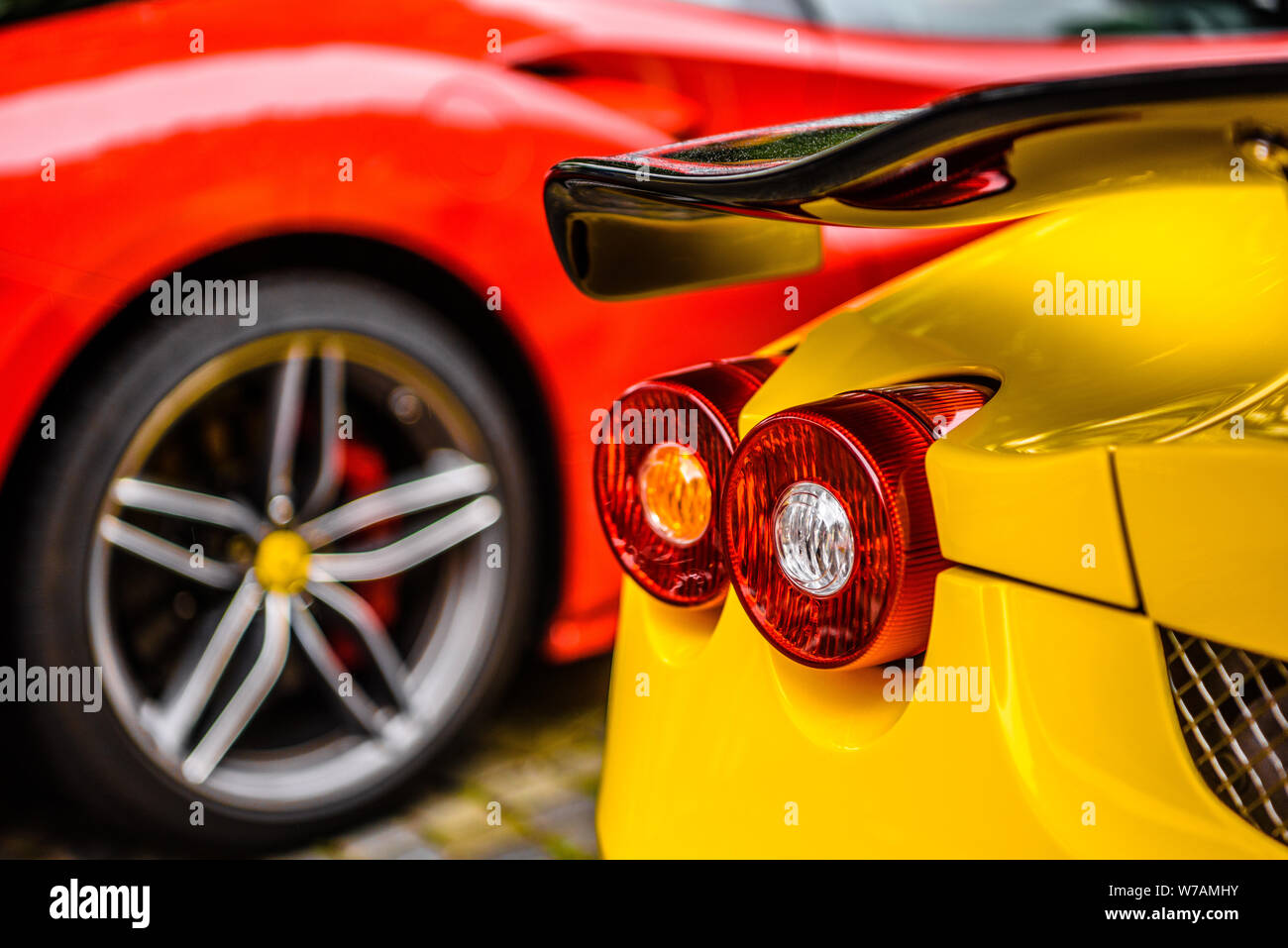 GERMANY, FULDA - JUL 2019: rearview lights of yellow FERRARI F430 Type ...