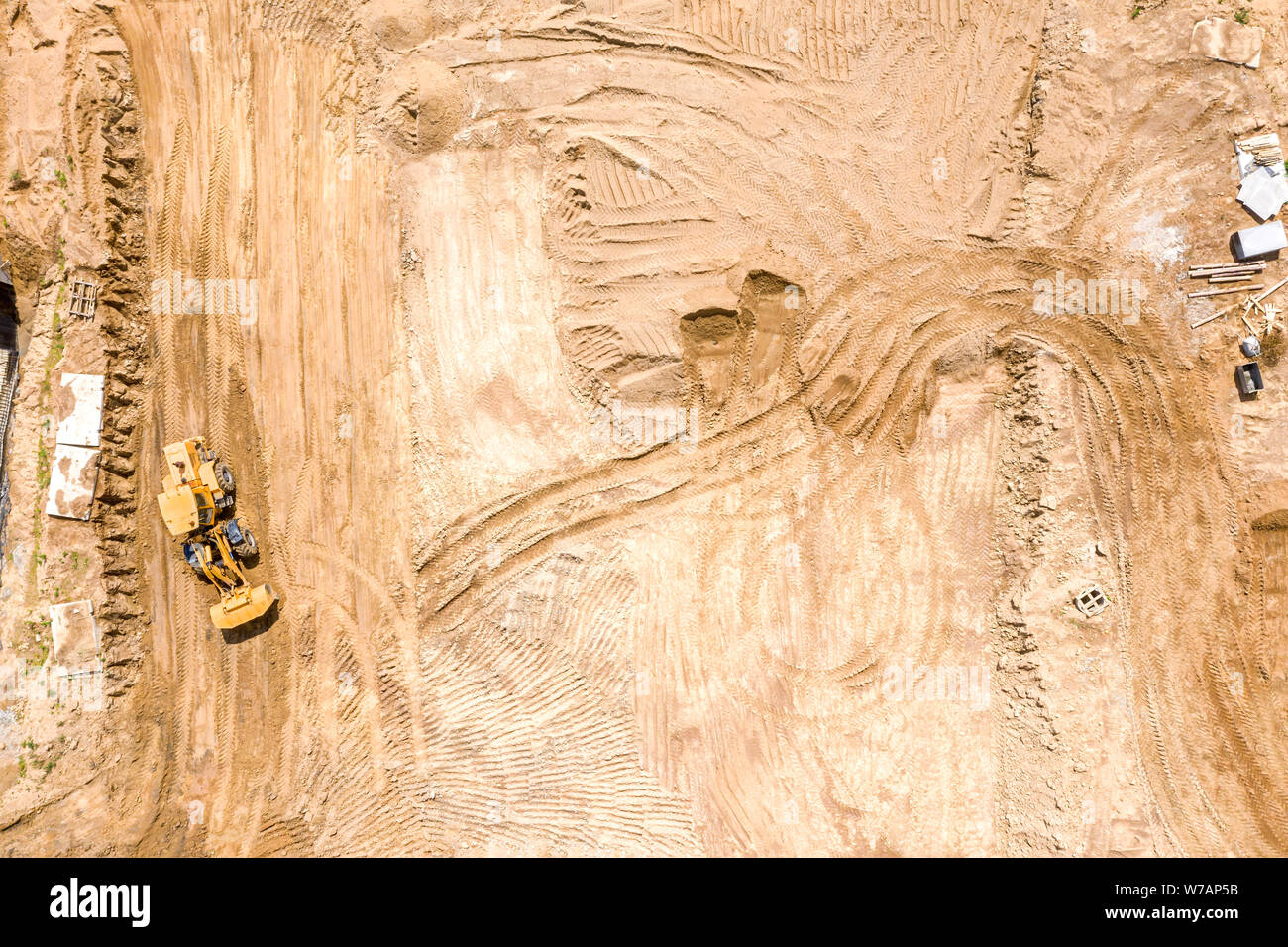 aerial top view of heavy earthmover working at construction site Stock ...