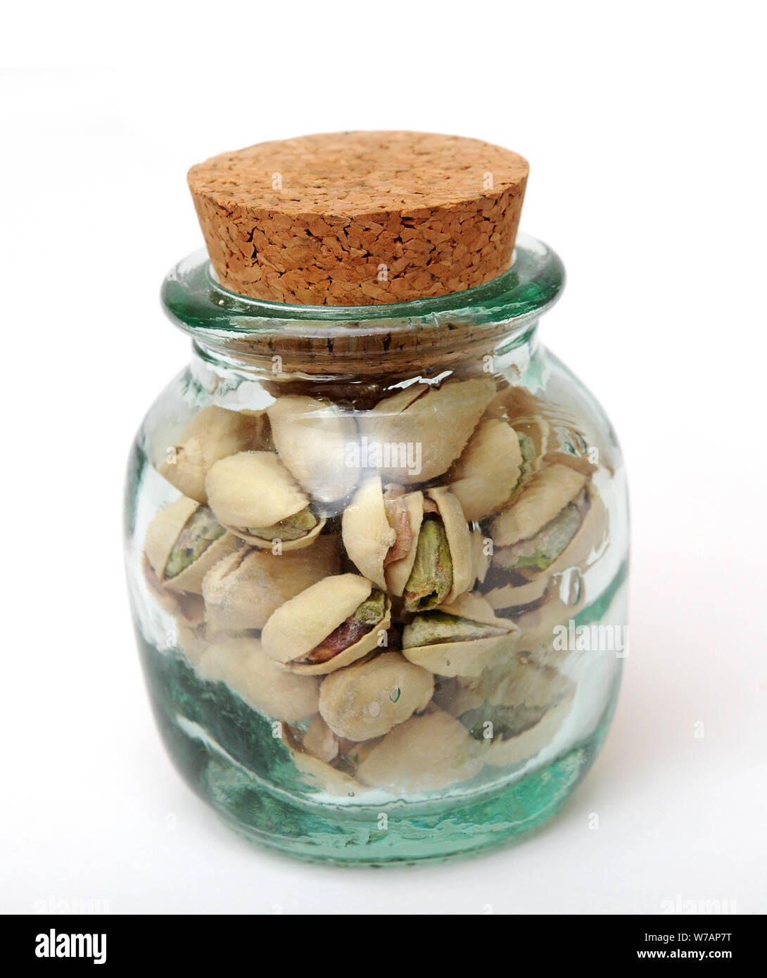 a group of pistachio in jar Stock Photo - Alamy