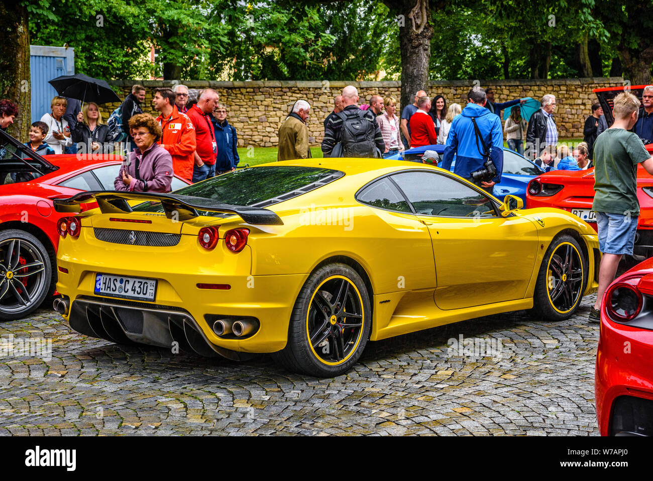GERMANY, FULDA - JUL 2019: rearview lights of yellow FERRARI F430 Type ...