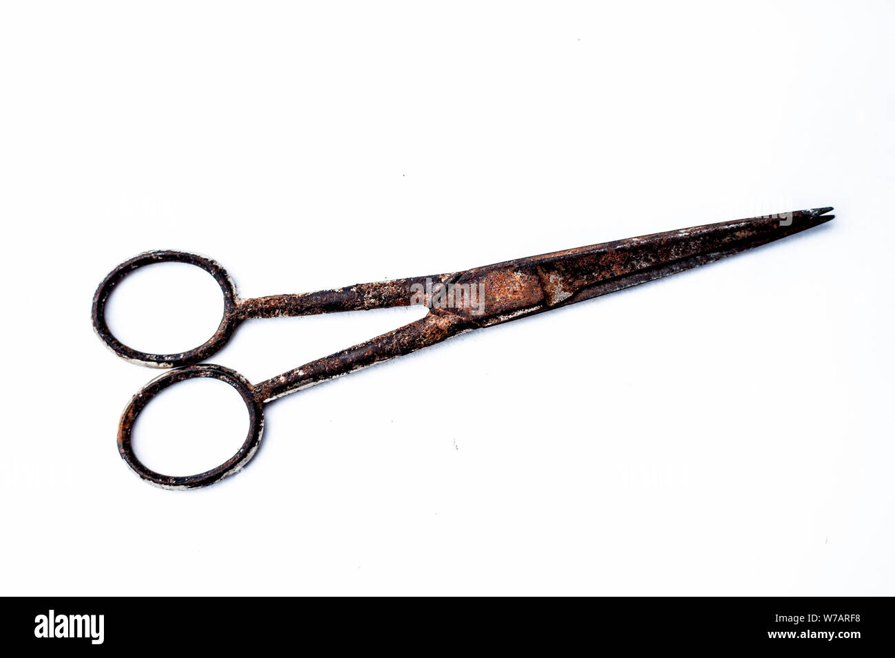 Close up of rusted metal scissor isolated on white Stock Photo - Alamy