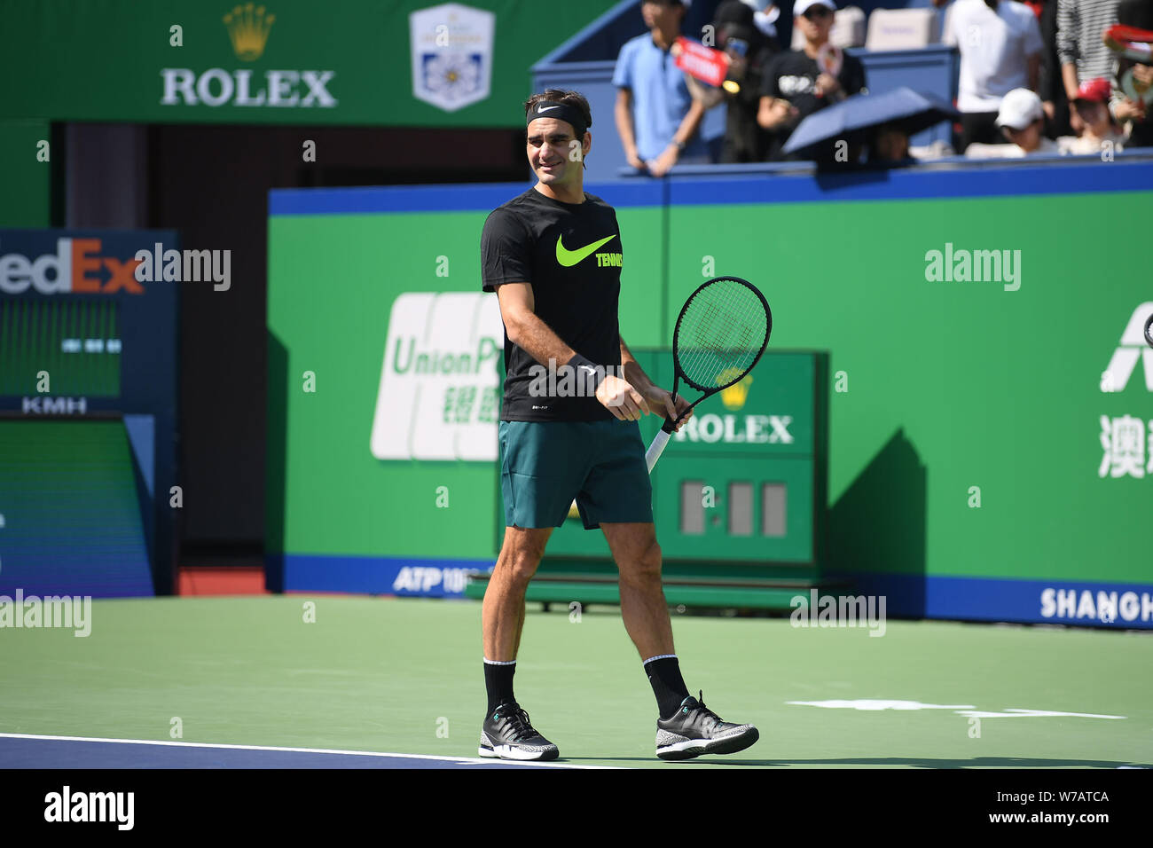 Swiss tennis player Roger Federer takes part in a training session for ...