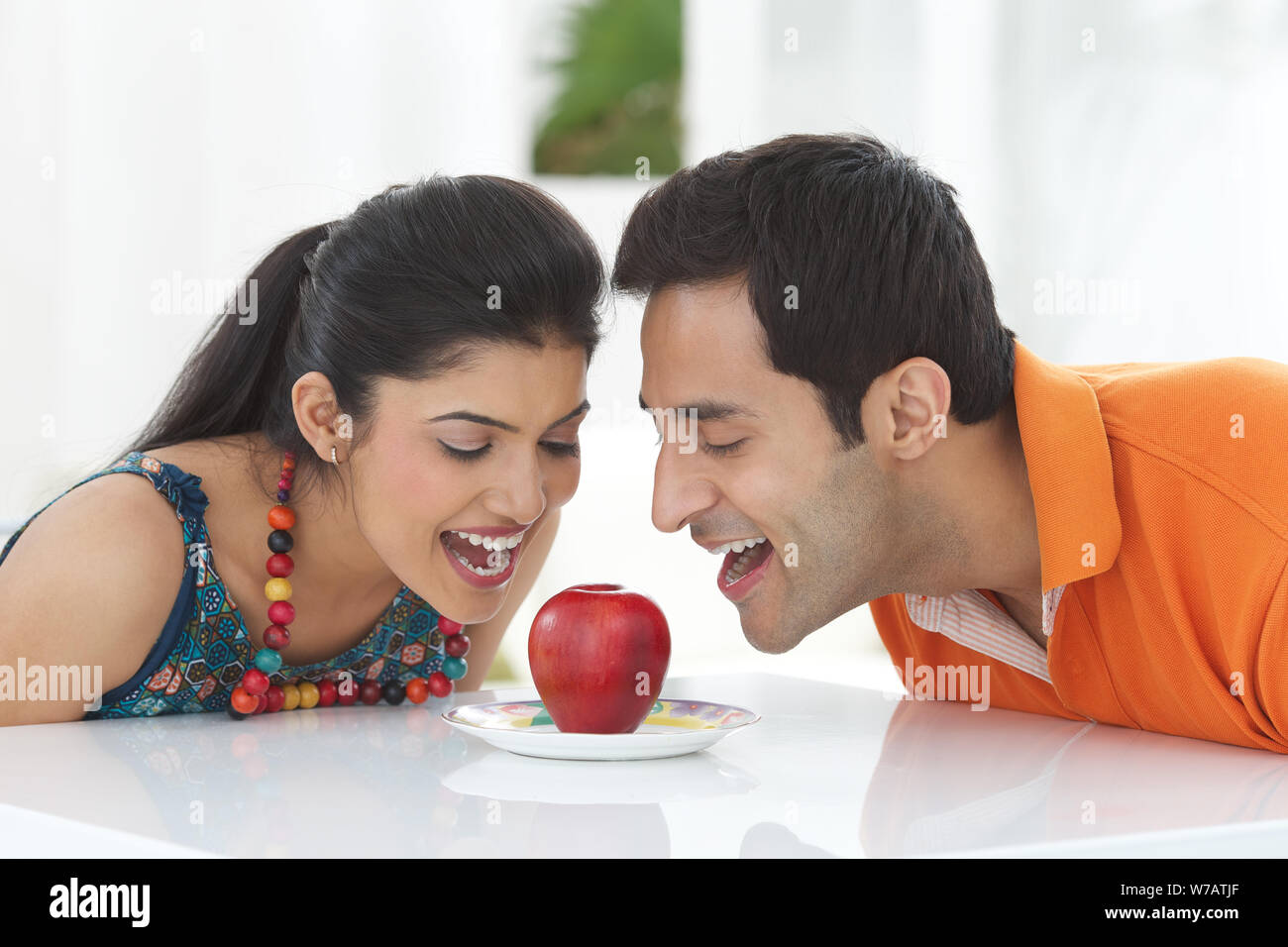 Mouth eating apple hi-res stock photography and images - Alamy