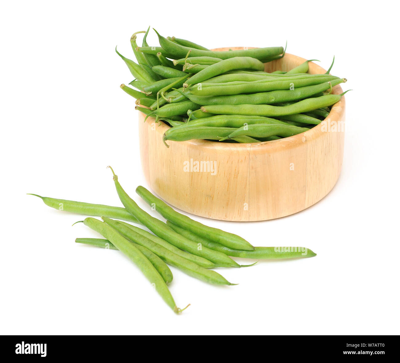 green beans fall off from round case on white background Stock Photo ...